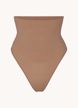SKIMS Seamless Sculpt high waisted corrigerende string • Lichtbruin ...
