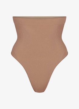 SKIMS Seamless Sculpt high waisted corrigerende string • Lichtbruin ...