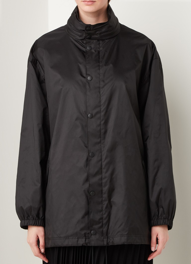 Balenciaga Regenjas met opbergbare capuchon • Zwart • de Bijenkorf