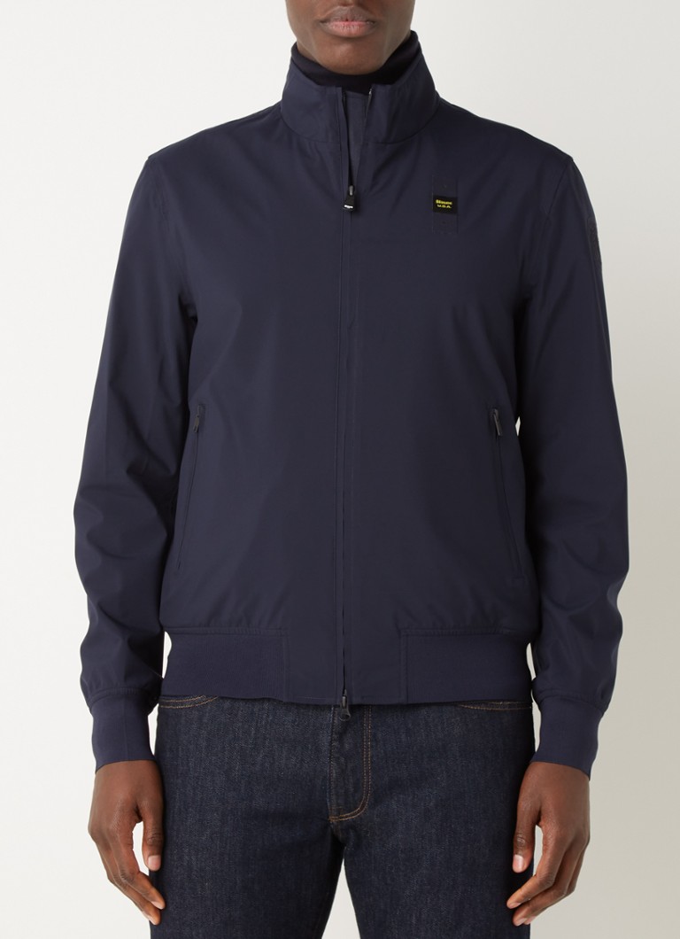 Blauer Softshell jack met ritszakken en logo • Donkerblauw • de Bijenkorf