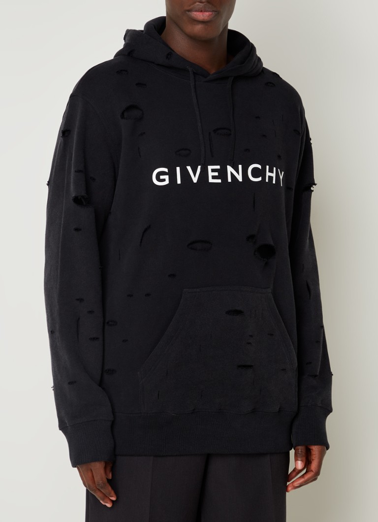 Givenchy Oversized hoodie met logoprint en destroyed afwerking • Zwart ...