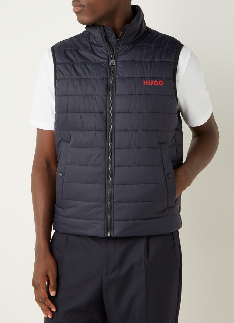 HUGO BOSS Bentino gewatteerde bodywarmer met logo • Donkerblauw • de ... HUGO BOSS Bentino gewatteerde bodywarmer met logo • Donkerblauw • de ...