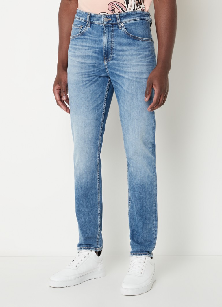 HUGO BOSS Taber tapered leg jeans met medium wassing • Indigo • de ...