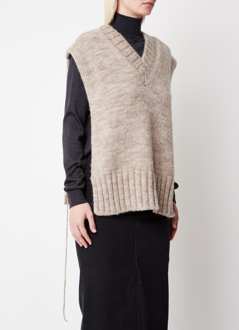 Maison Margiela Sioth grofgebreide poncho in alpaca wolblend met V-hals ...