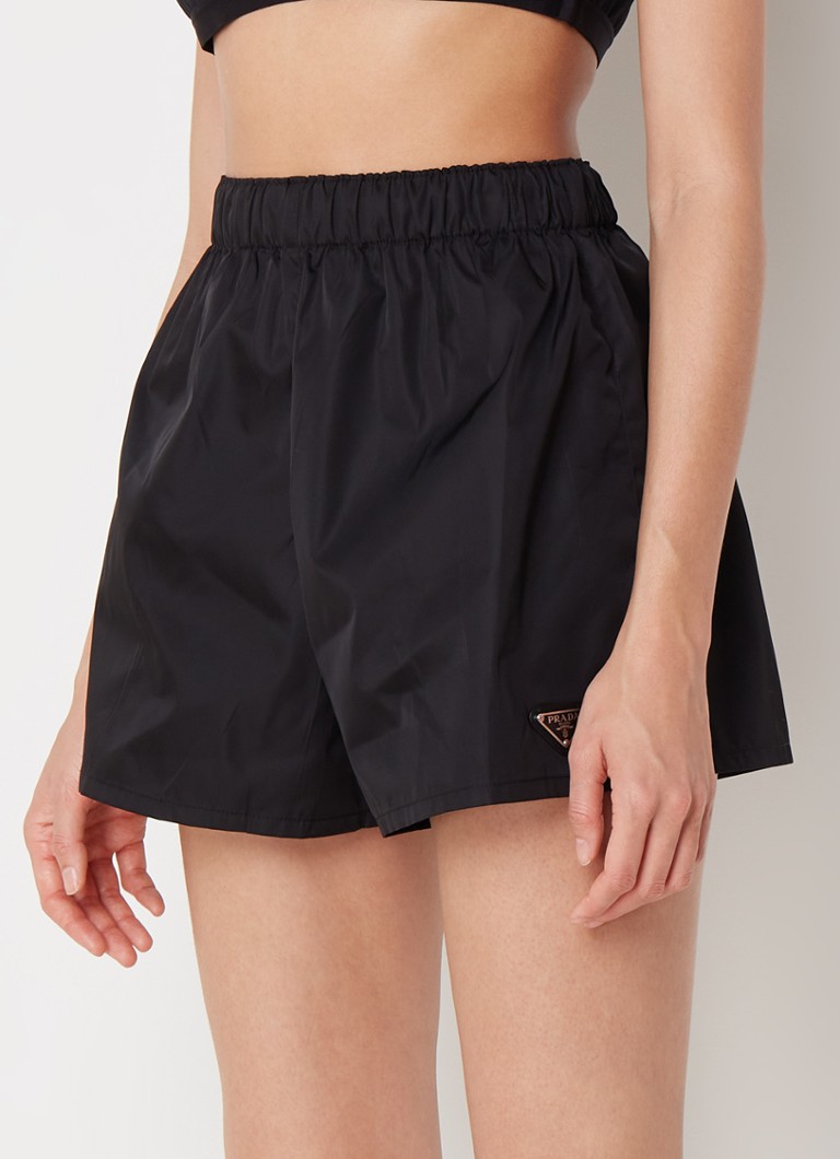 Prada Re-Nylon high waist wide fit shorts met logo • Zwart • de Bijenkorf