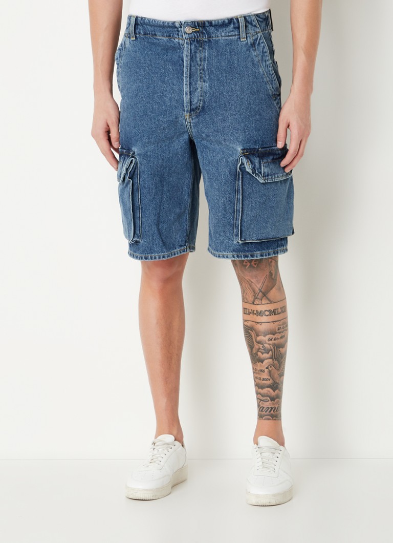 Sandro Baggy fit korte broek van denim met medium wassing • Indigo • de ...
