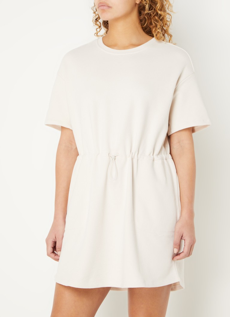 UGG Anisha mini T-shirt jurk met trekkoord en steekzakken • Creme • de Bijenkorf