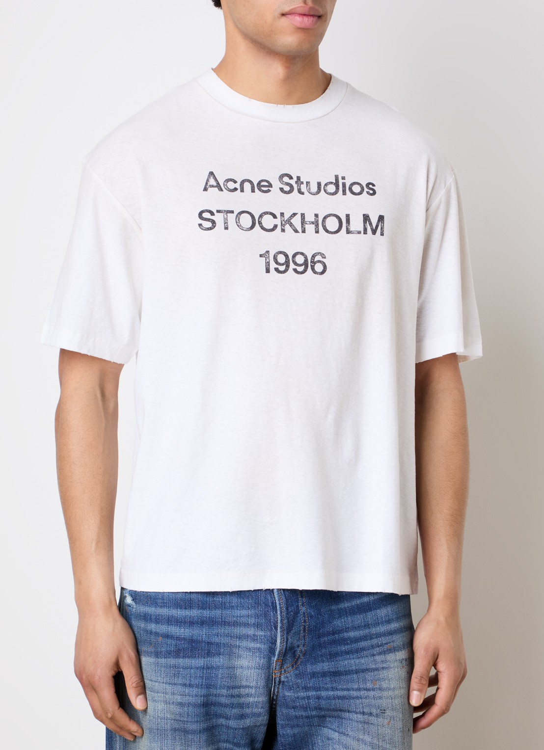 Acne Studios T-shirt met logoprint • Gebroken wit • de Bijenkorf
