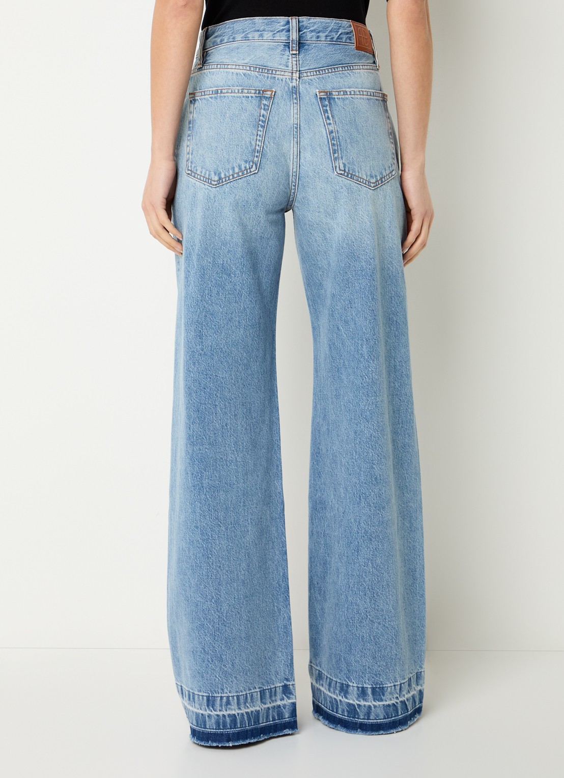 Anine Bing Lewis high waist flared fit jeans met medium wassing • Blauw ...