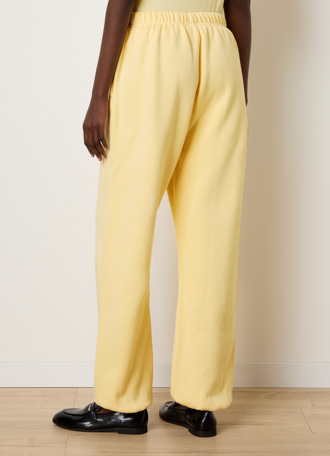 Fear of God Essentials High waist tapered fit joggingbroek met logo ...