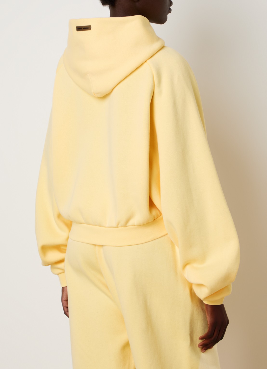 Fear of God Essentials Hoodie met logoborduring • Lichtgeel • de Bijenkorf