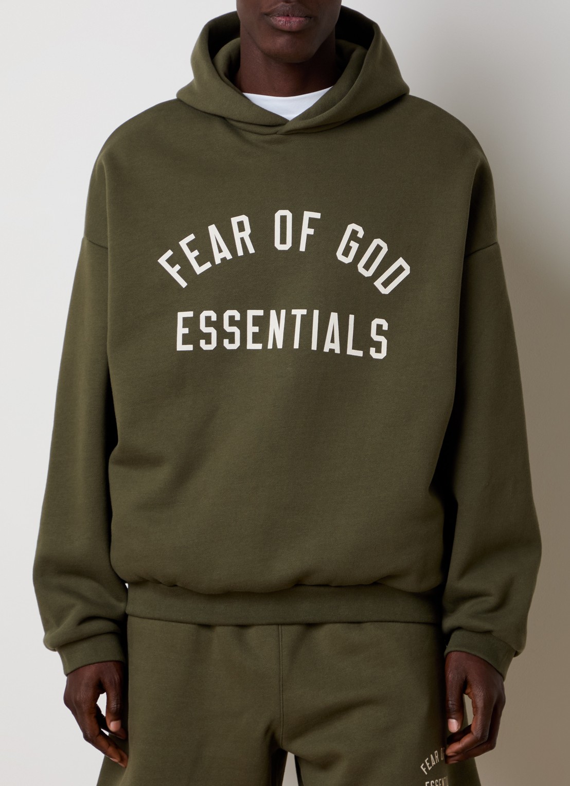 Fear of God Essentials Hoodie met logoprint • Bronsgroen • de Bijenkorf