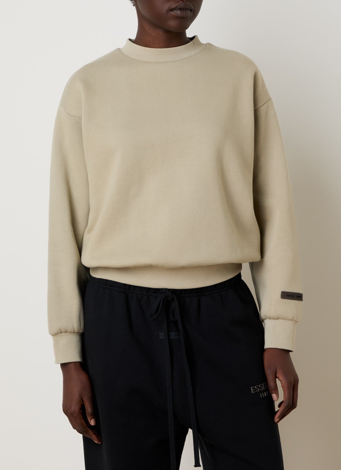 Fear of God Essentials Sweater met backprint • Beige • de Bijenkorf