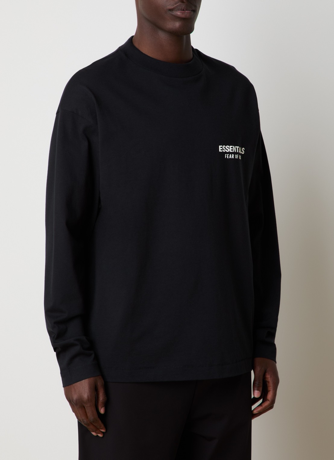 Fear of God Essentials T-shirt met logo- en backprint • Zwart • de ...
