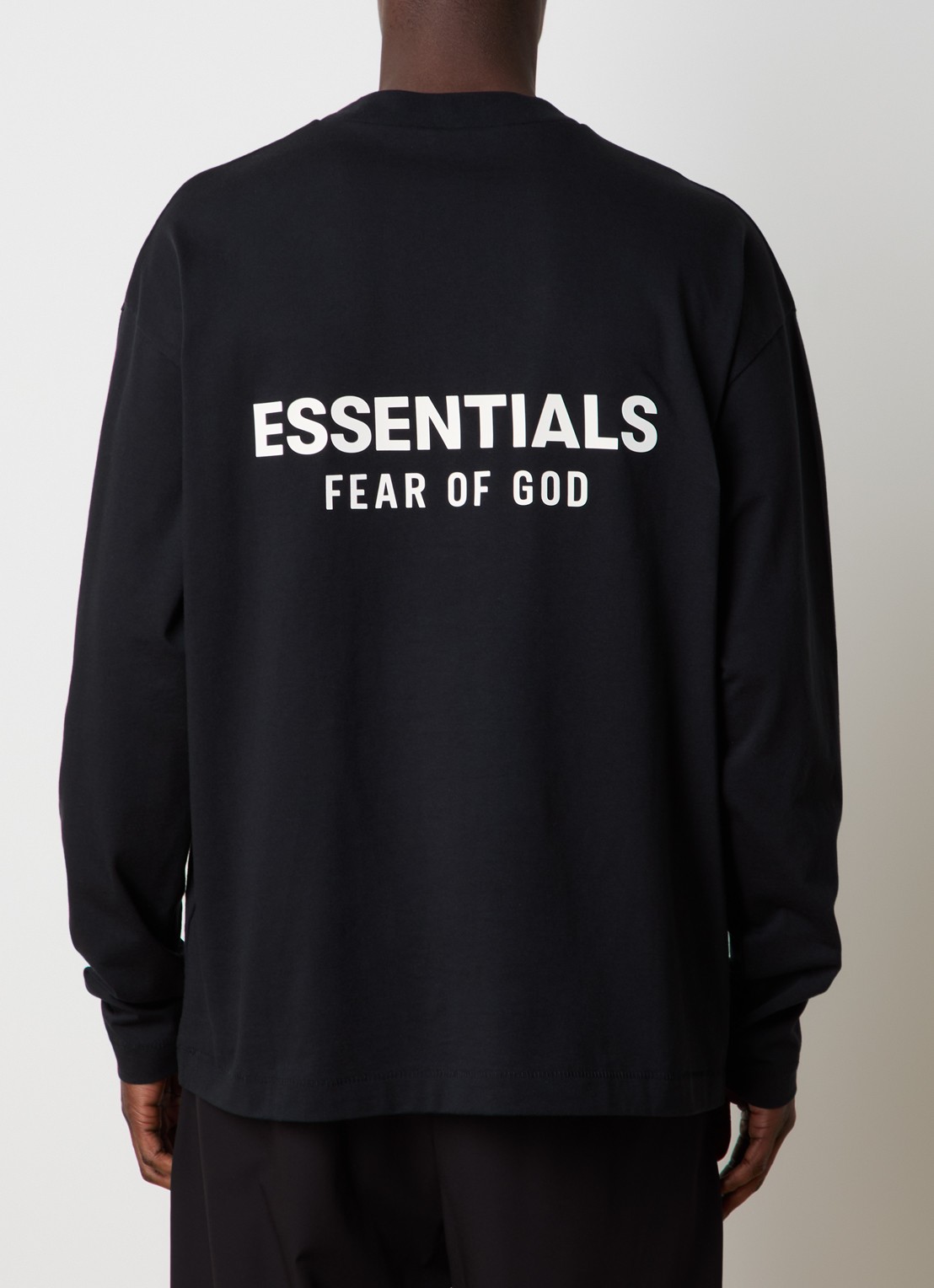 Fear of God Essentials T-shirt met logo- en backprint • Zwart • de ...