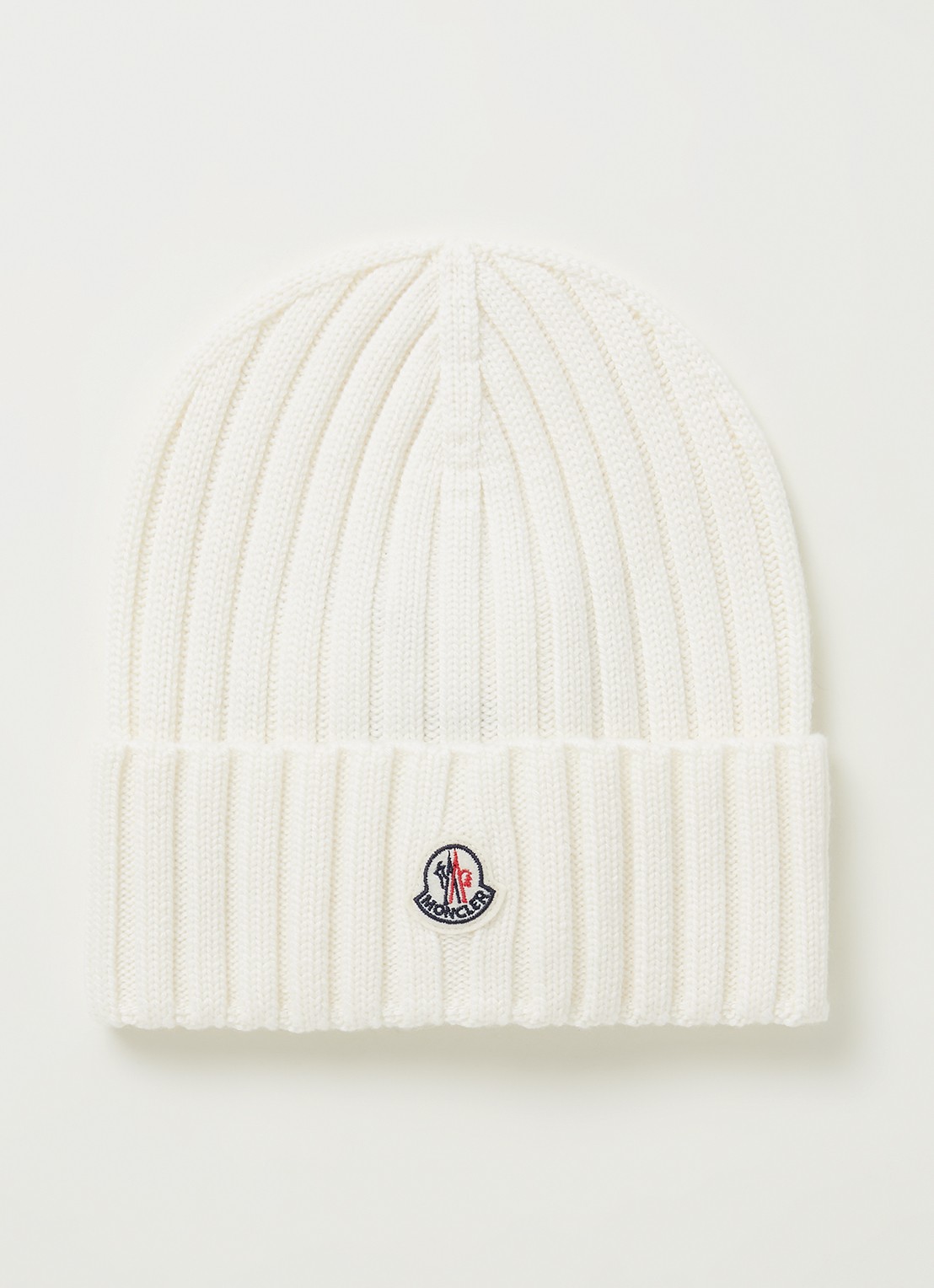 Moncler Grofgebreide muts met logo • Gebroken wit • de Bijenkorf